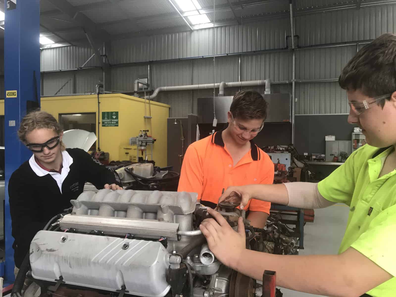 Students demonstrating trade training in the workplace - South ...